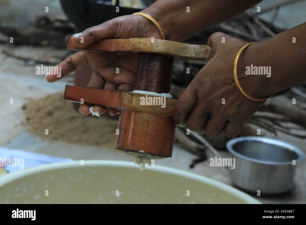 Preparing South Indian Homemade rice Murukku for Diwali festival snacks ...