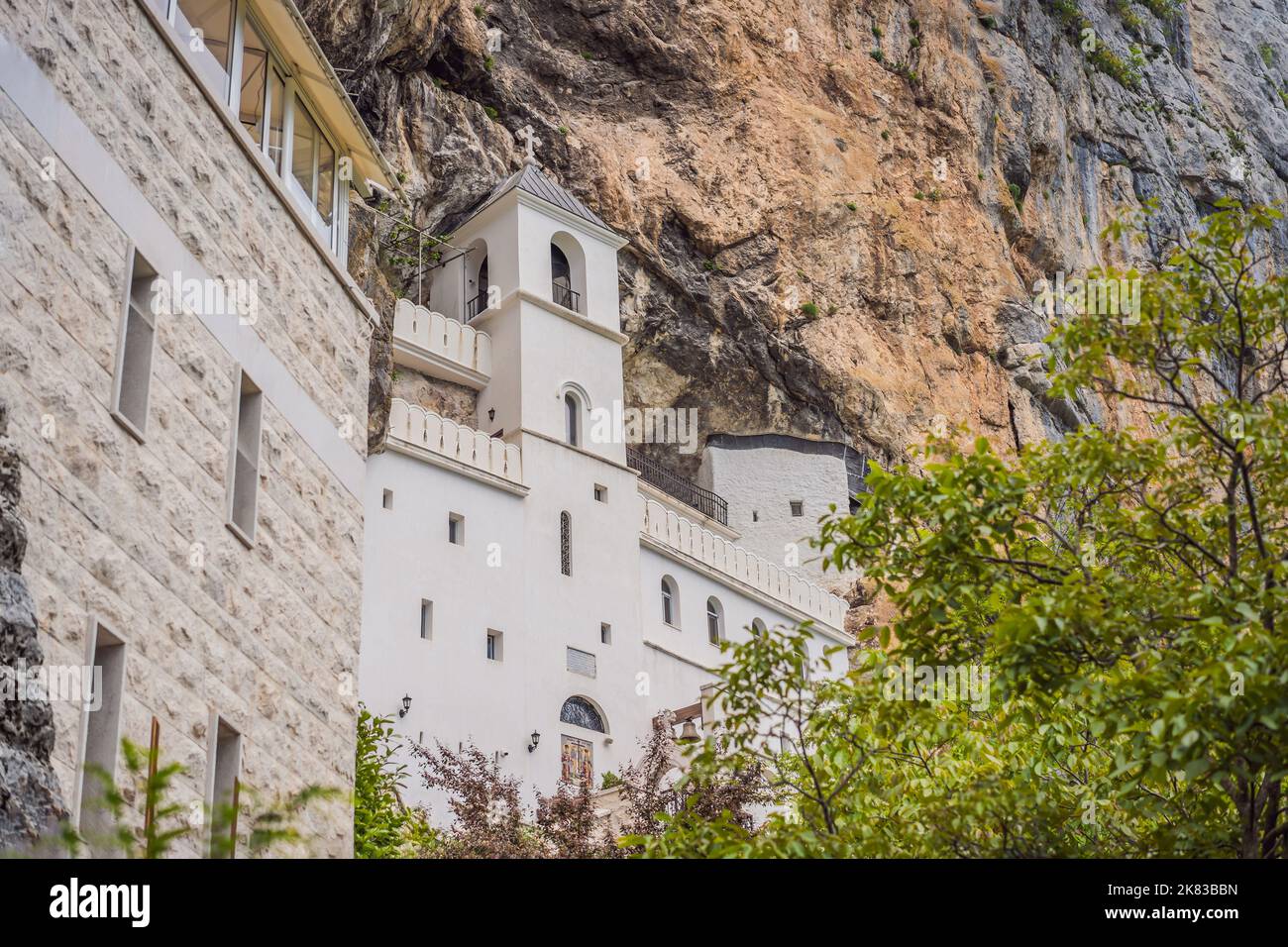 Monastery of Ostrog, Serbian Orthodox Church situated against a ...
