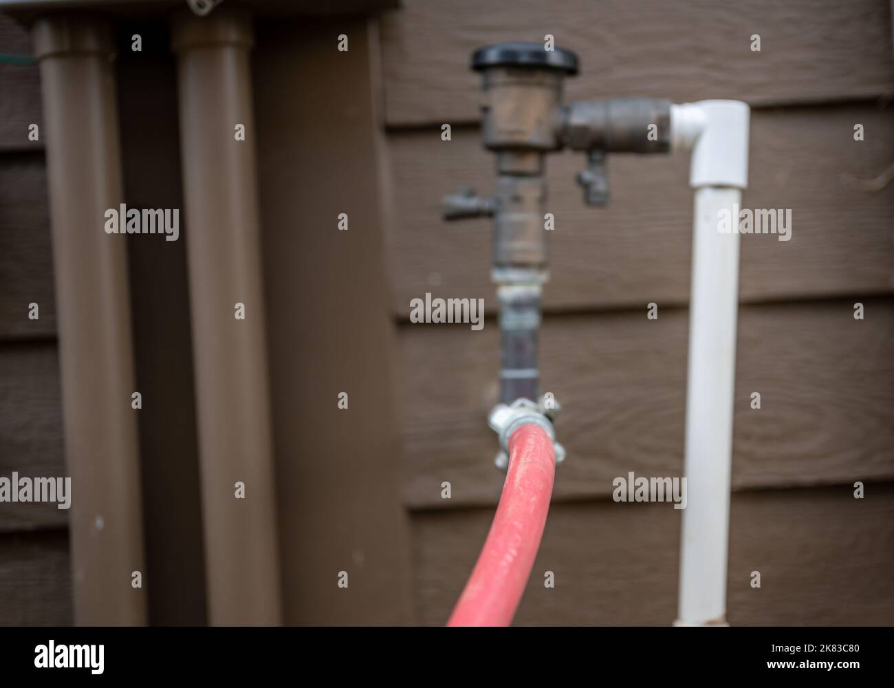 Winterizing a residential irrigation system by using a compressor and ...