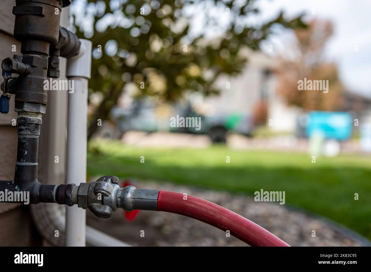 Winterizing a residential irrigation system by using a compressor and ...