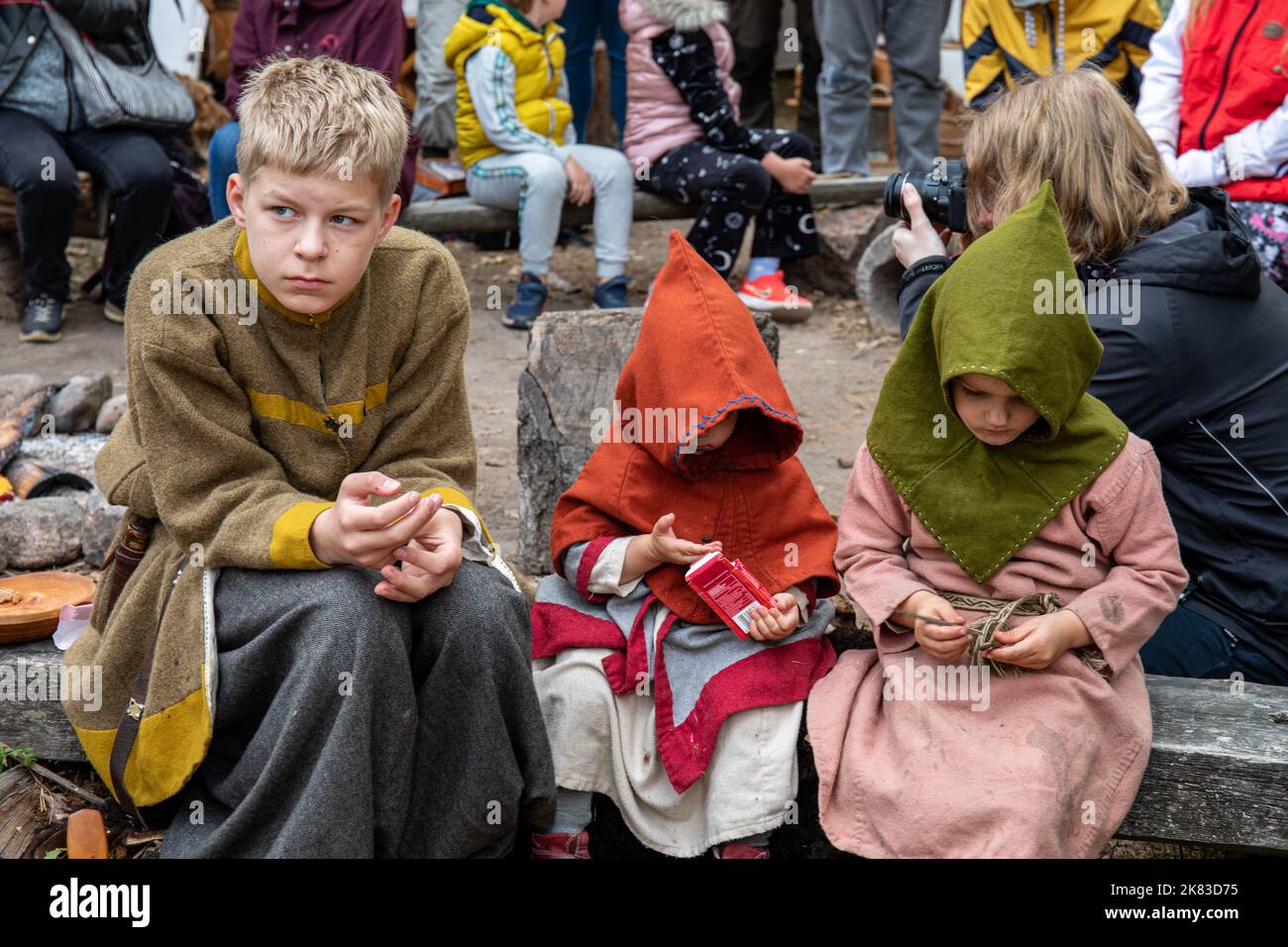 Children at Pukkisaari Iron Age Market re-enactment in Vähä-Meilahti ...