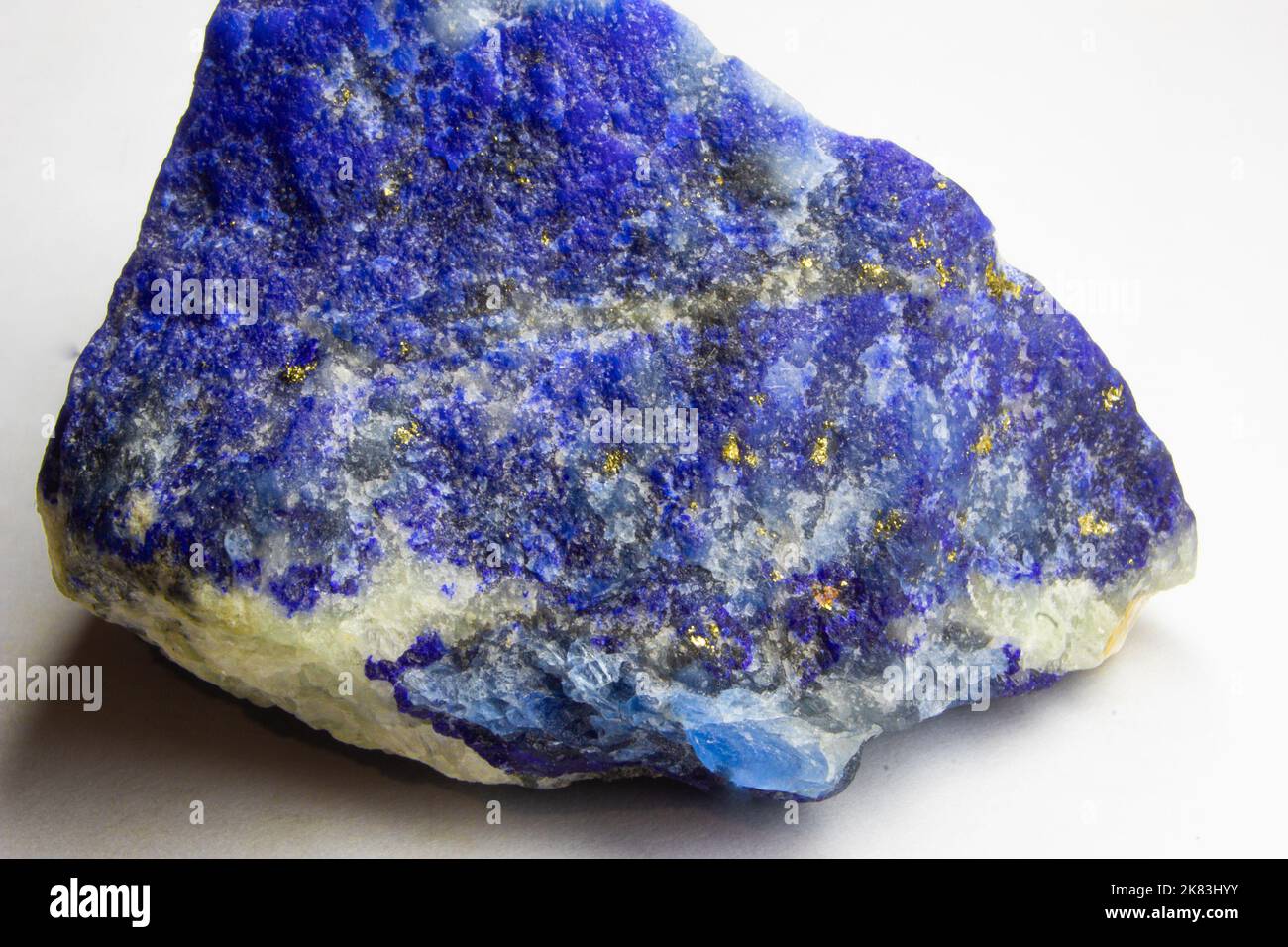 Raw Lapis lazuli rock on white background. Unpolished chunk of lapis ...