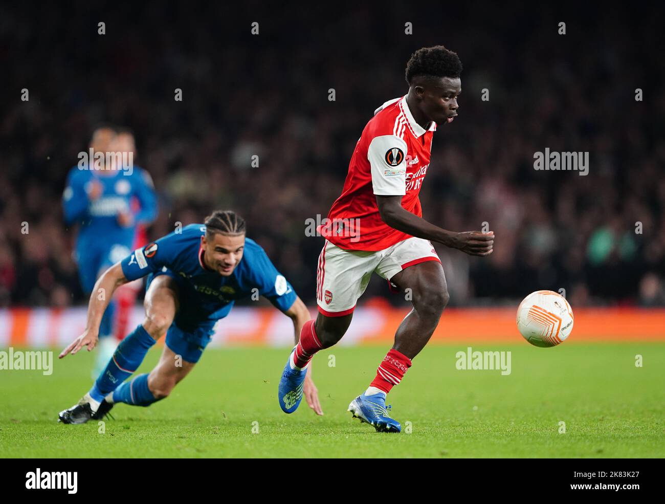 Arsenal's Bukayo Saka gets away from PSV Eindhoven's Armando Obispo ...