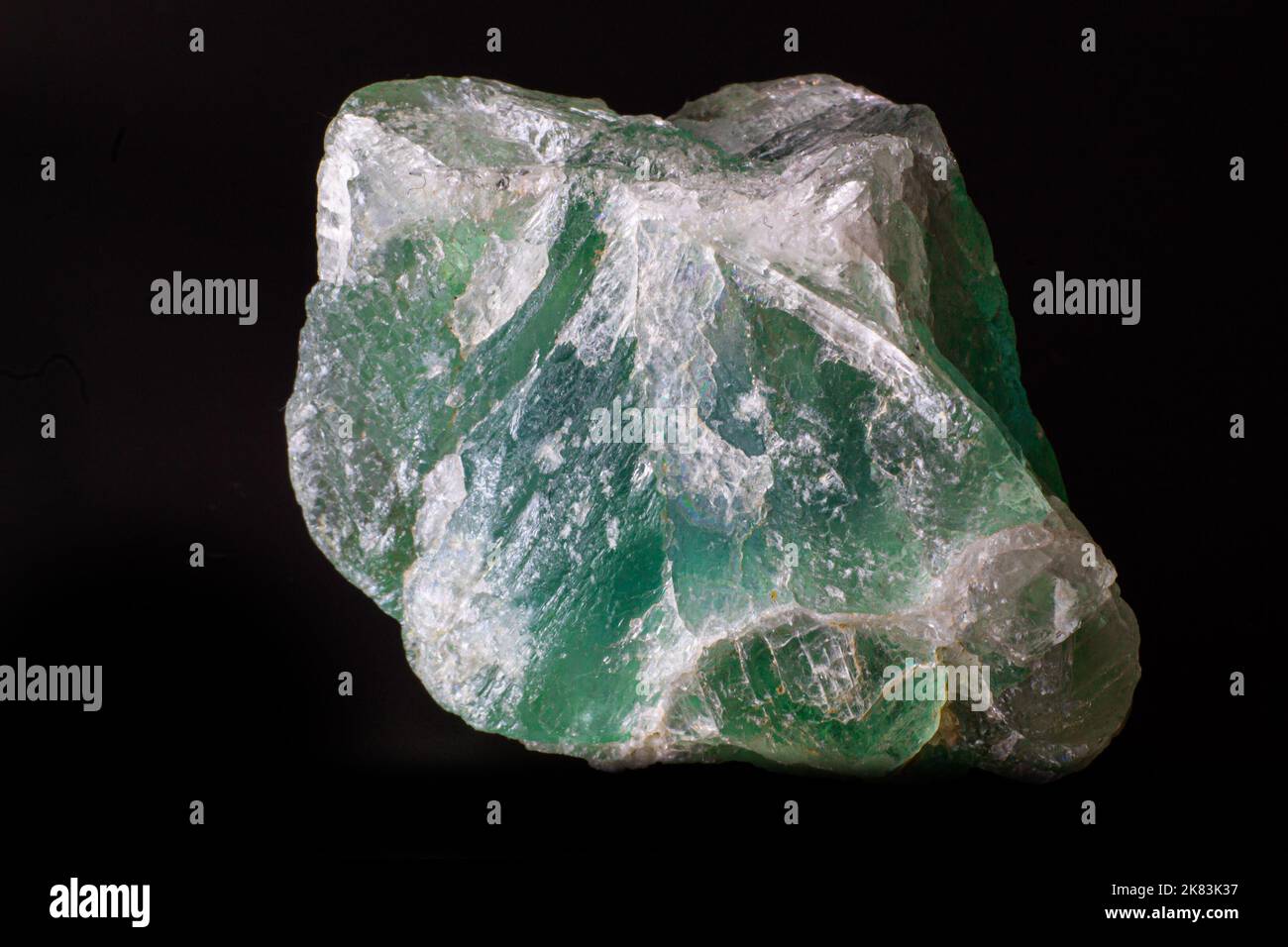 Macro rough green fluorite stone isolated on black surface Stock Photo ...