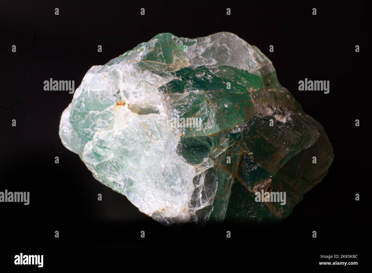 Macro rough green fluorite stone isolated on black surface Stock Photo ...