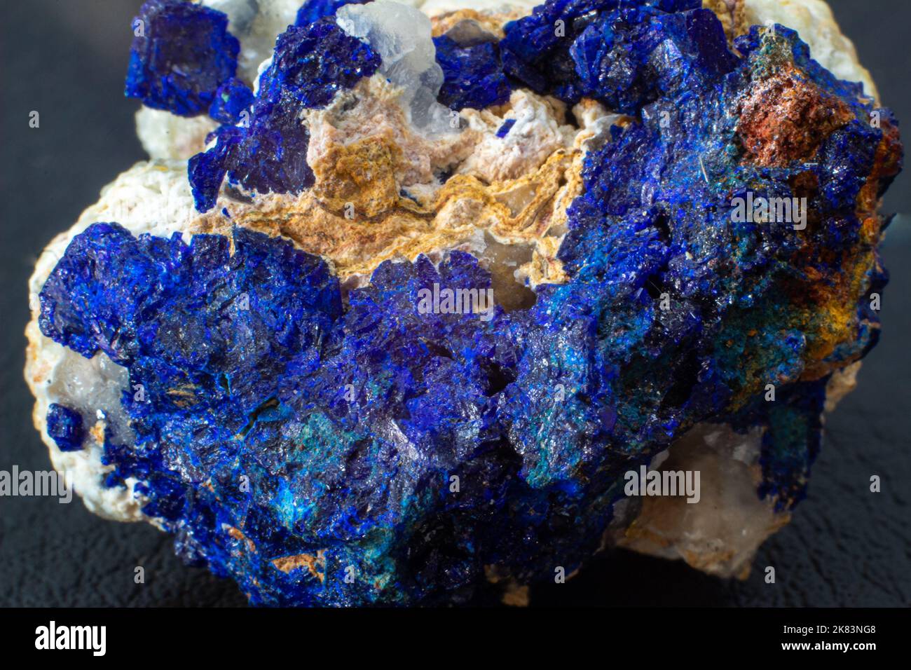 Macro blue azurite cluster on white matrix isolated crystal on black ...