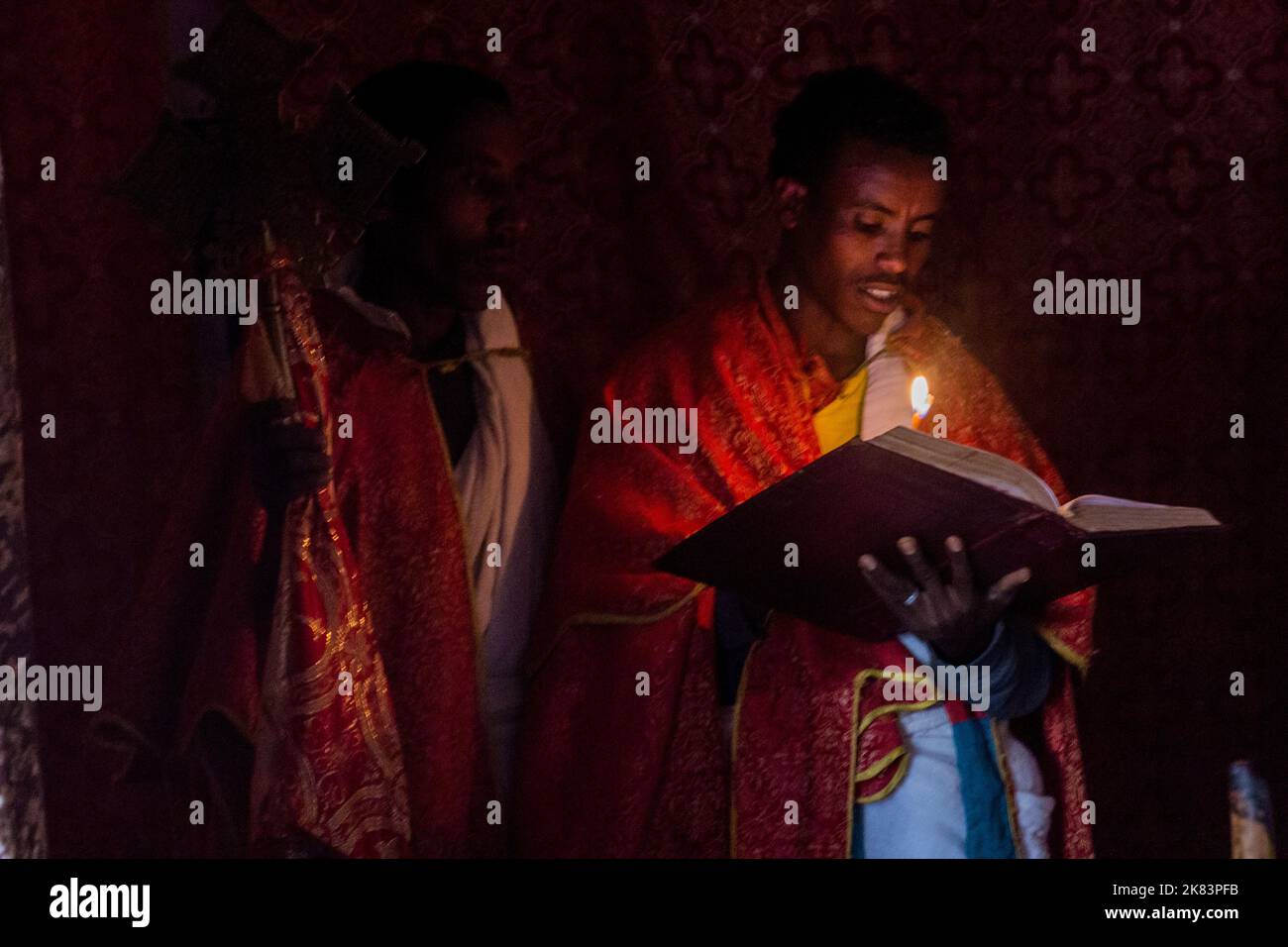 TIGRAY, ETHIOPIA - MARCH 22, 2019: Priest reading a Bible in Abuna ...