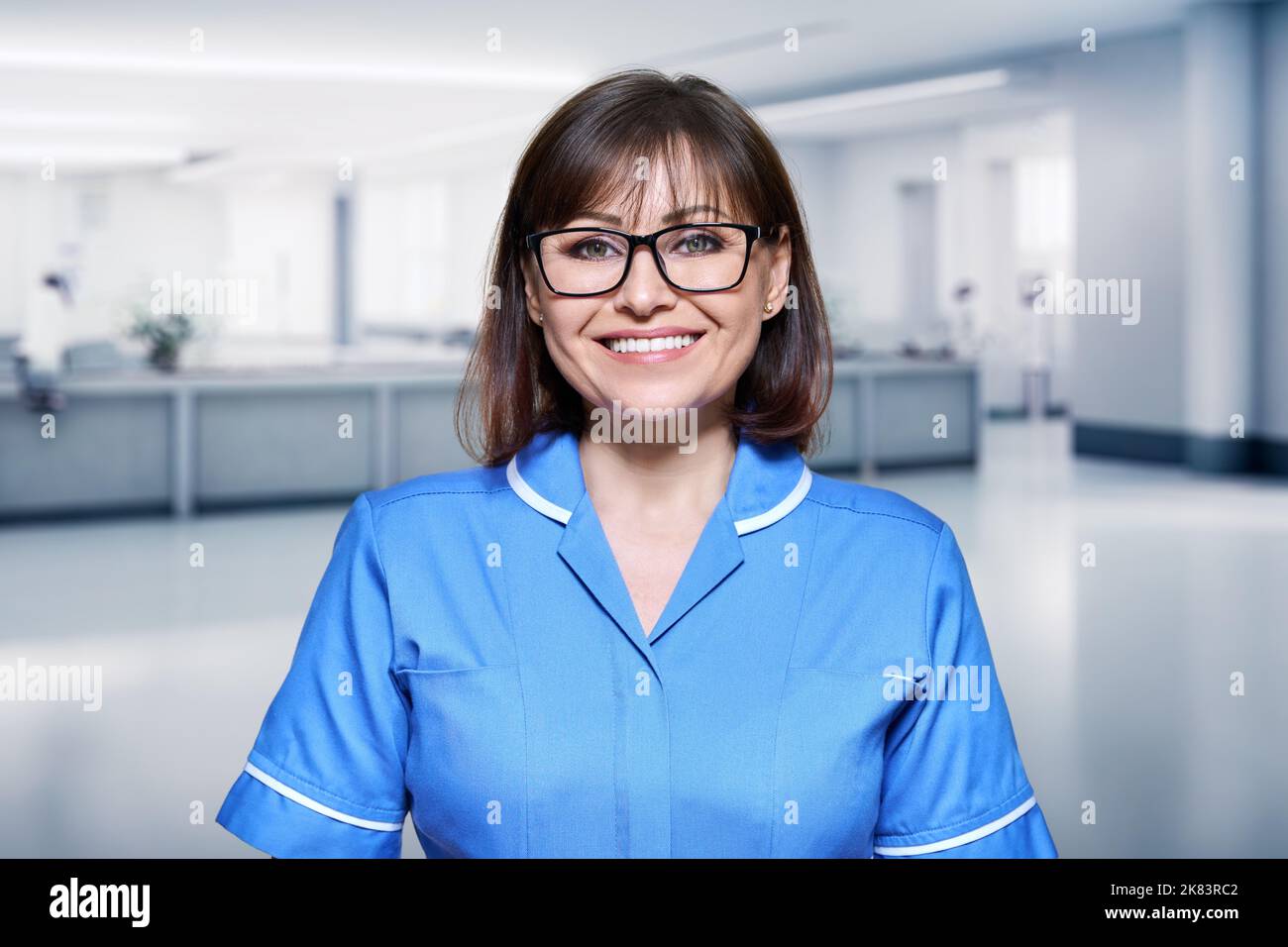 Portrait of a female nurse inside the hospital Stock Photo - Alamy