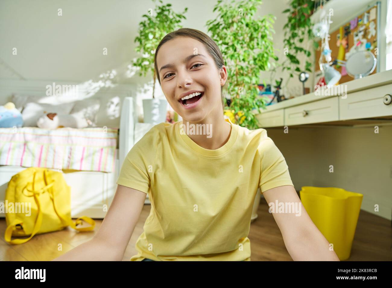 Adolescent teenage girl student having video call, looking at webcam ...