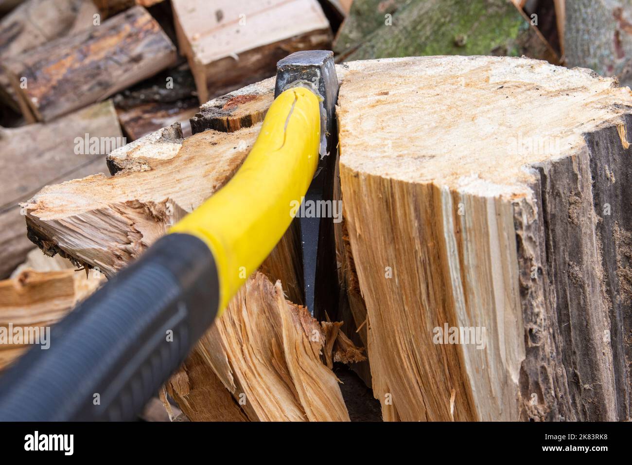 An ax and a stump while chopping firewood on a clear day Stock Photo ...