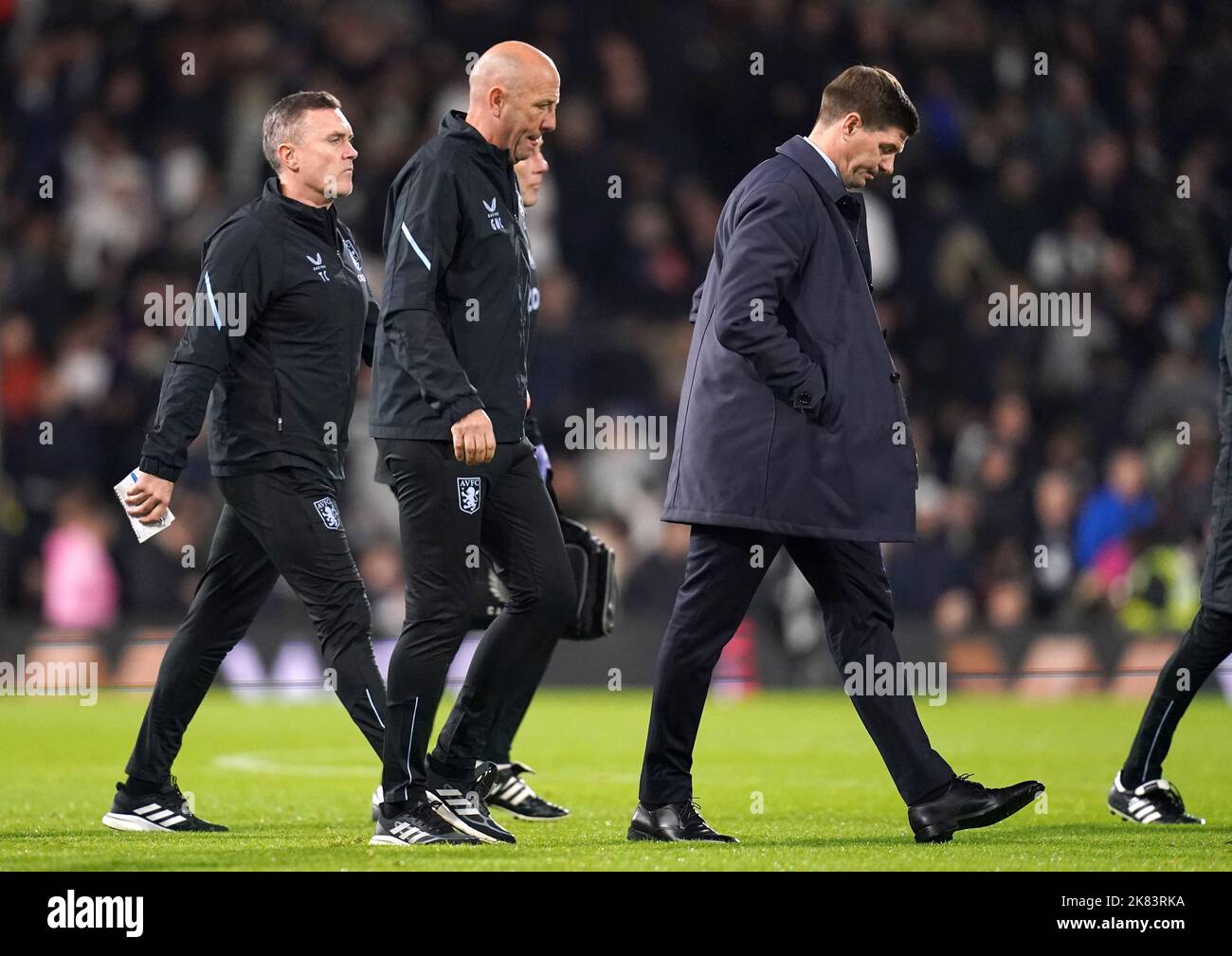 Aston Villa manager Steven Gerrard (right) walks off the pitch at half ...