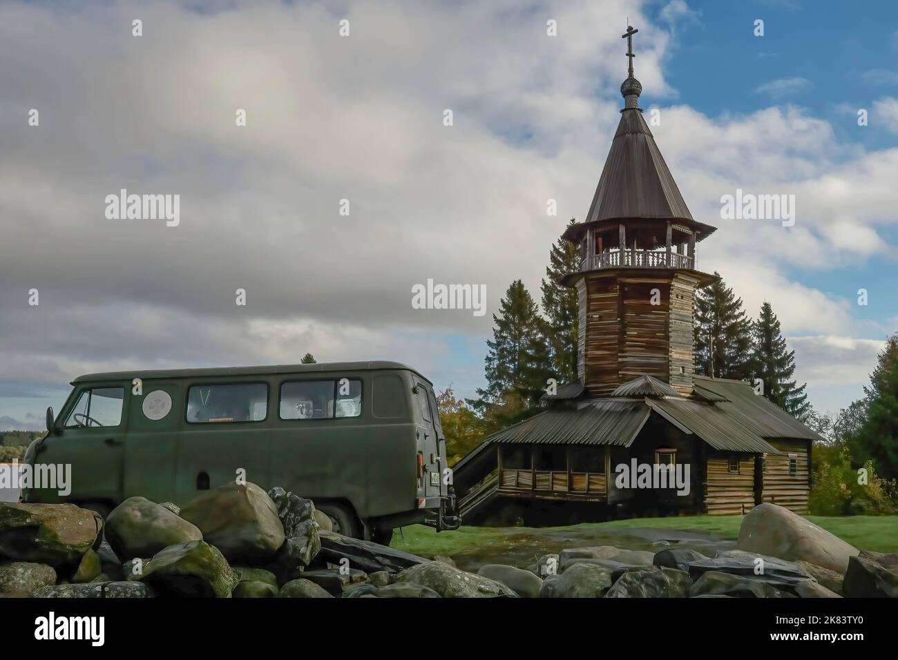 Soviet SUV "Bukhanka" at the ancient chapel on the island of Kizhi in ...
