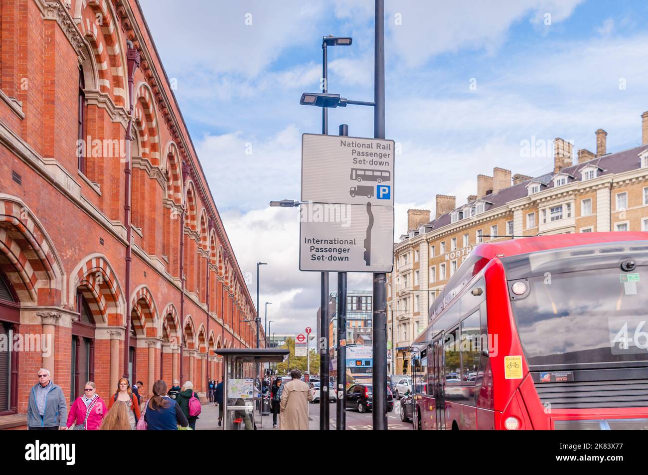 People and baggage walking on walkway east side of St Pancras ...