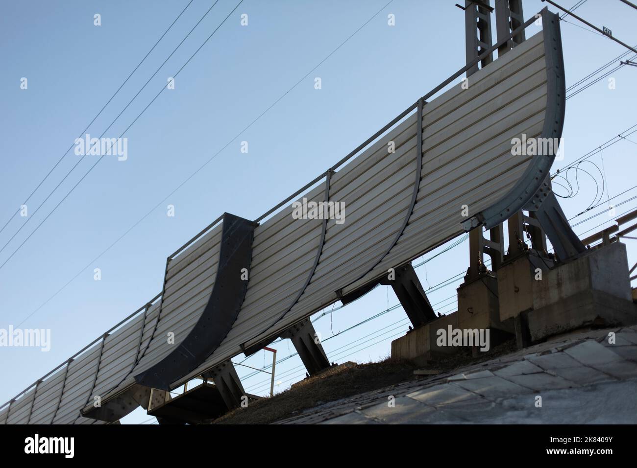 Fence by railroad. Road fence. Soundproof wall on railway Stock Photo ...