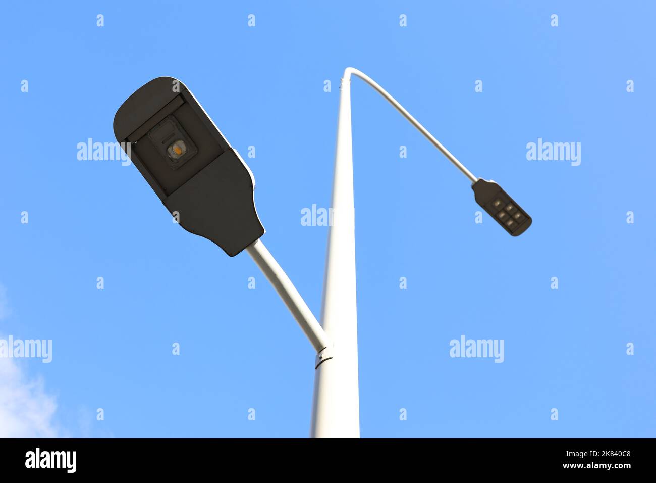 LED street lamp post on blue sky background. Led lights saving ...