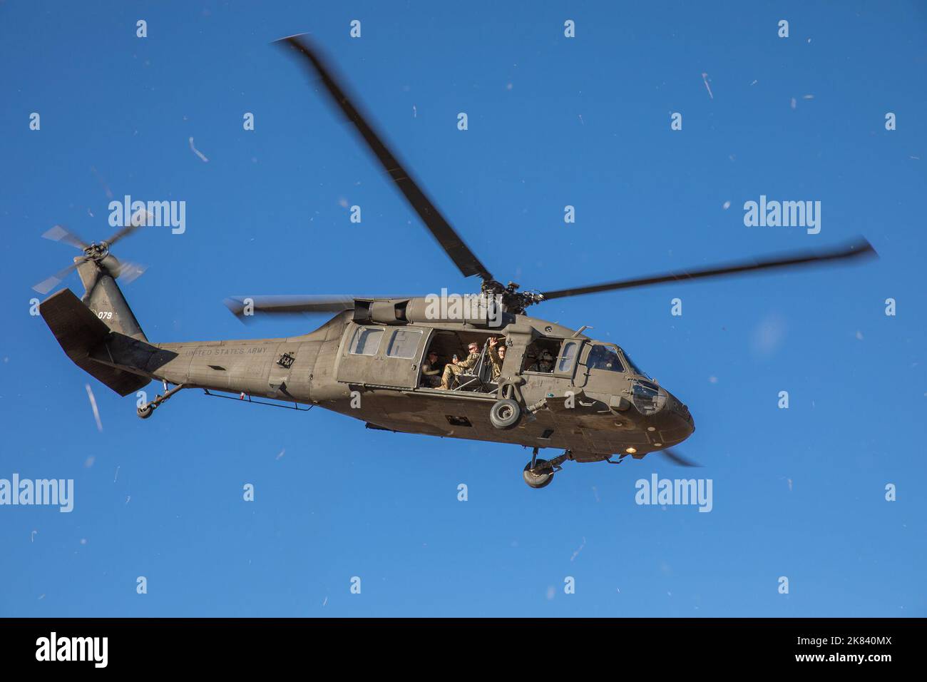 Soldiers and Airmen are airlifted to the 12-kilometer ruck march ...