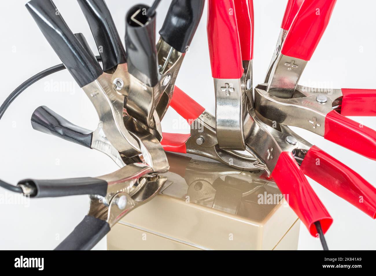 Overloaded cluster of red positive & negative battery crocodile clips ...
