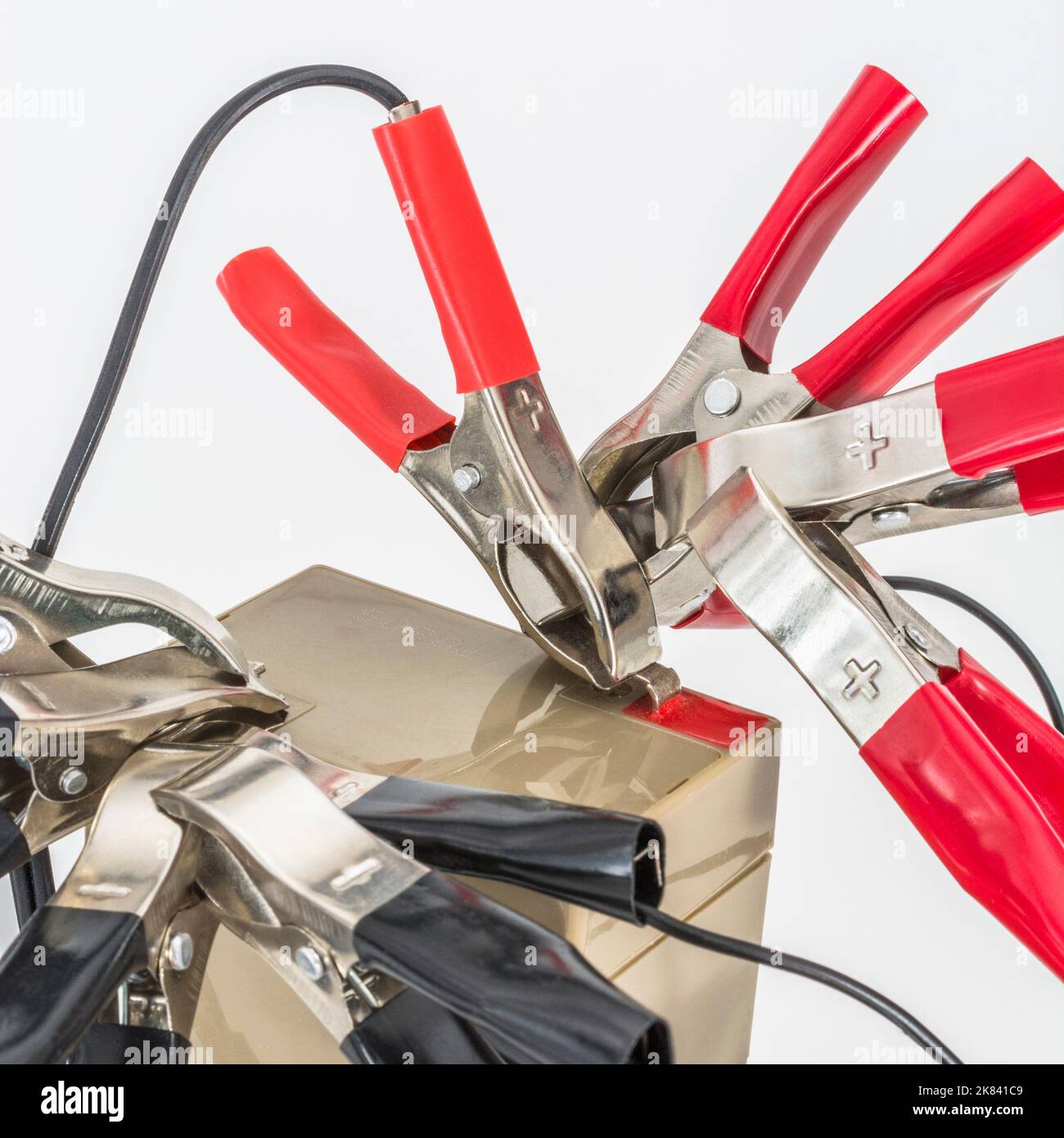 Overloaded cluster of red positive & negative battery crocodile clips ...