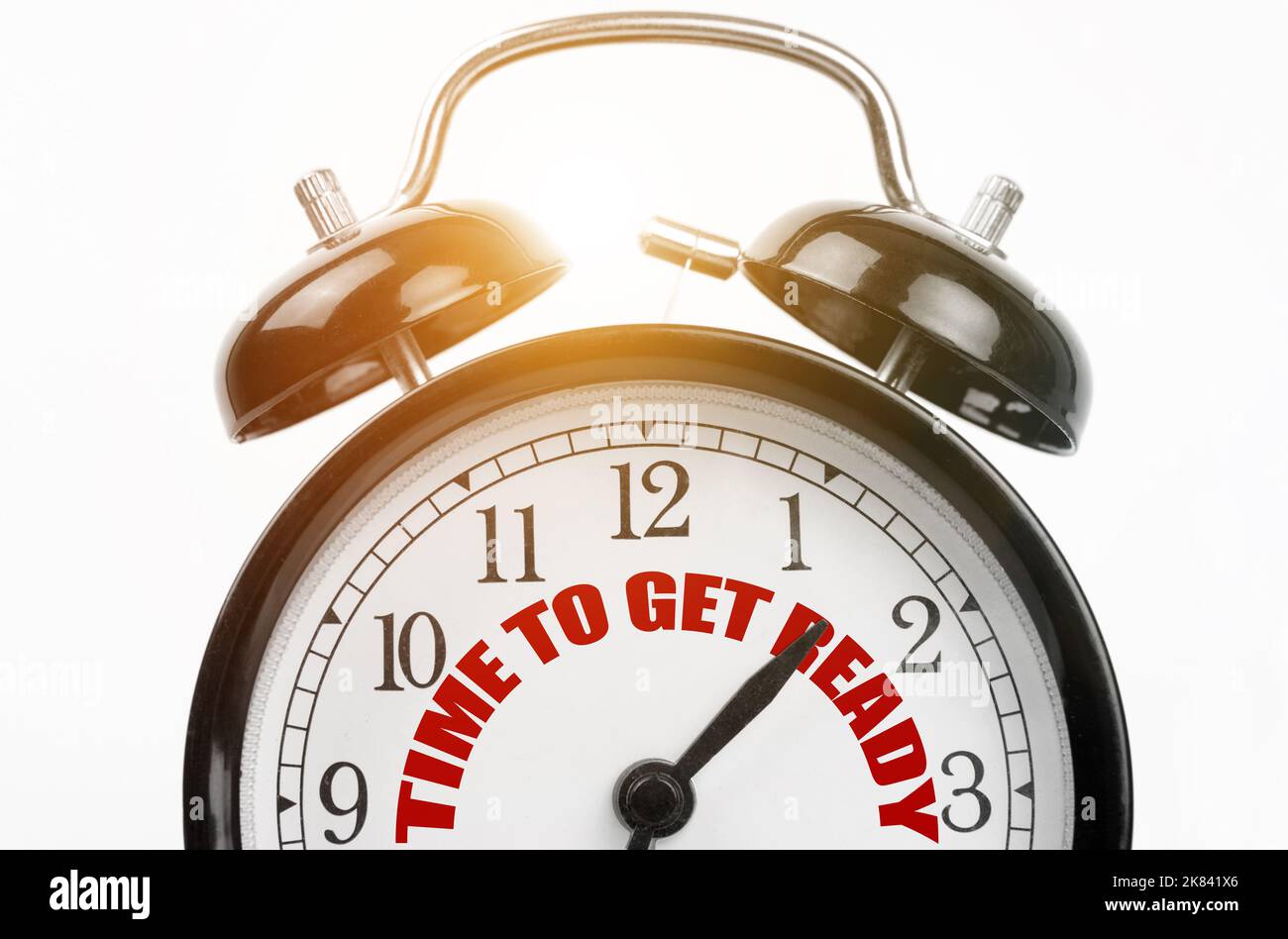 Finance and business concept. On the dial of the alarm clock the ...