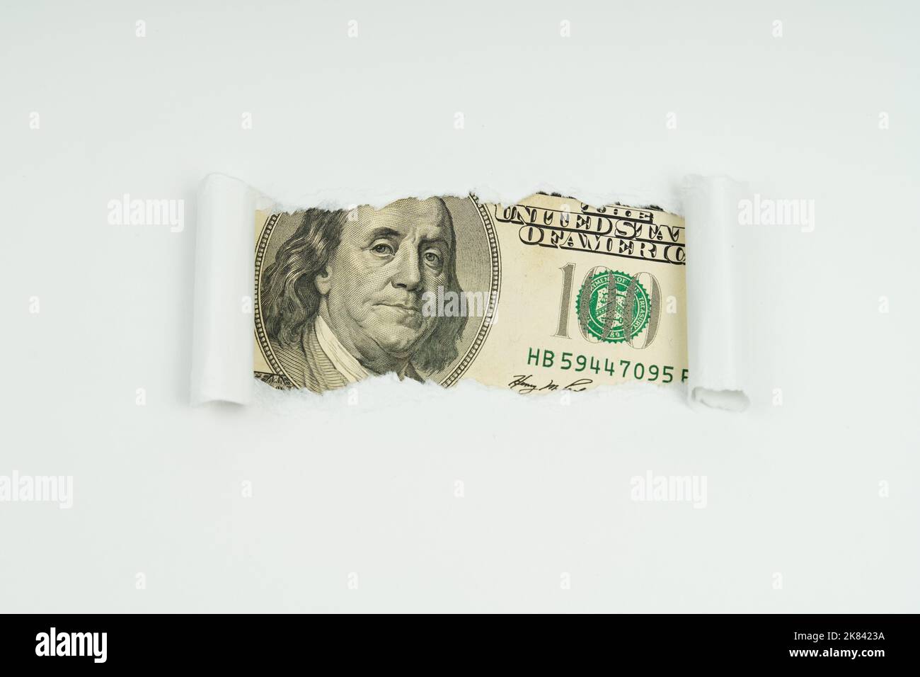 Business and finance concept. An image of a 100 dollar bill is visible ...