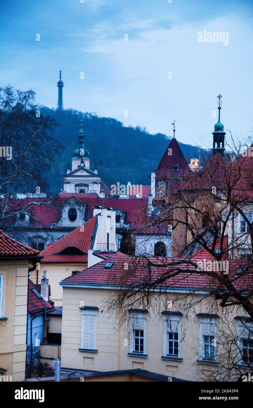 Charles Bridge view in Prague, Czech Republic reveals a conical roof ...
