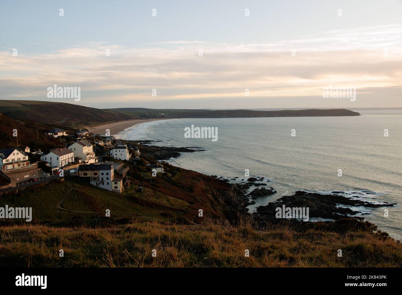 North Devon seacoast in the sunset. Wide angle coastal view of ...