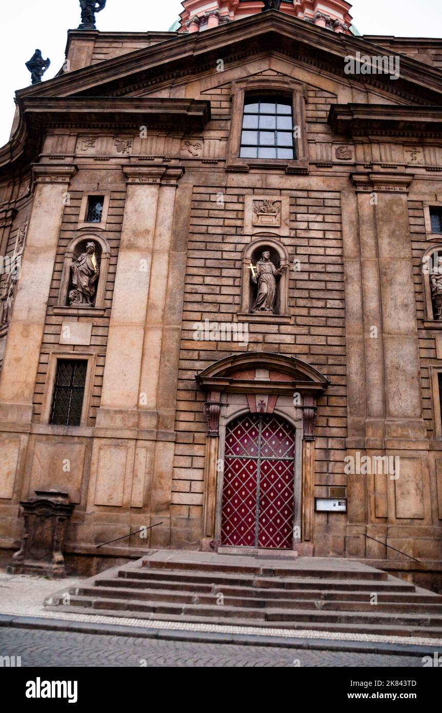 Arched door, niche, statues and broken pediment architectural elements ...