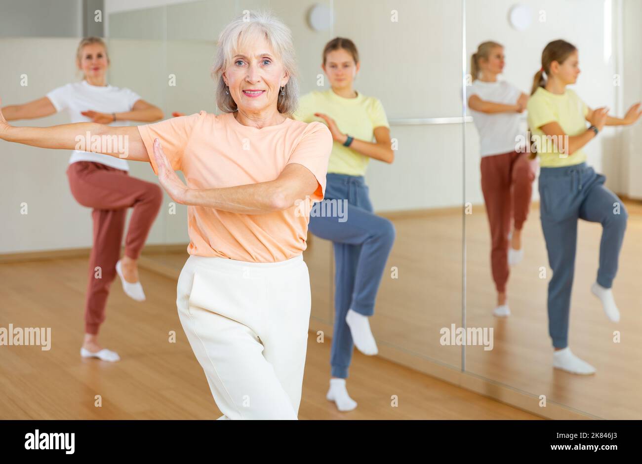 Ordinary females exercising dance moves in dance center Stock Photo - Alamy