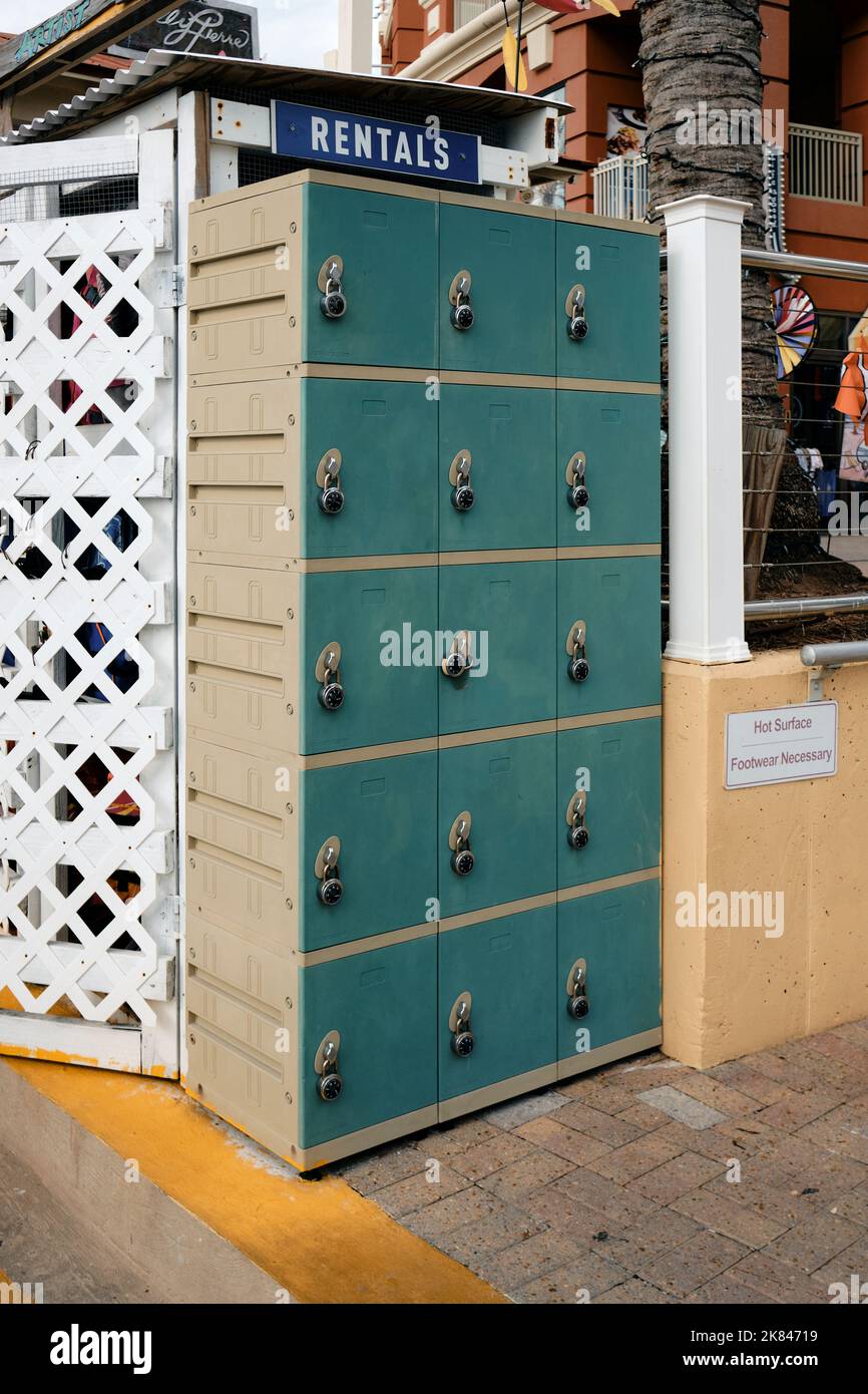 Rows of small rental storage lockers with combination locks, at the ...