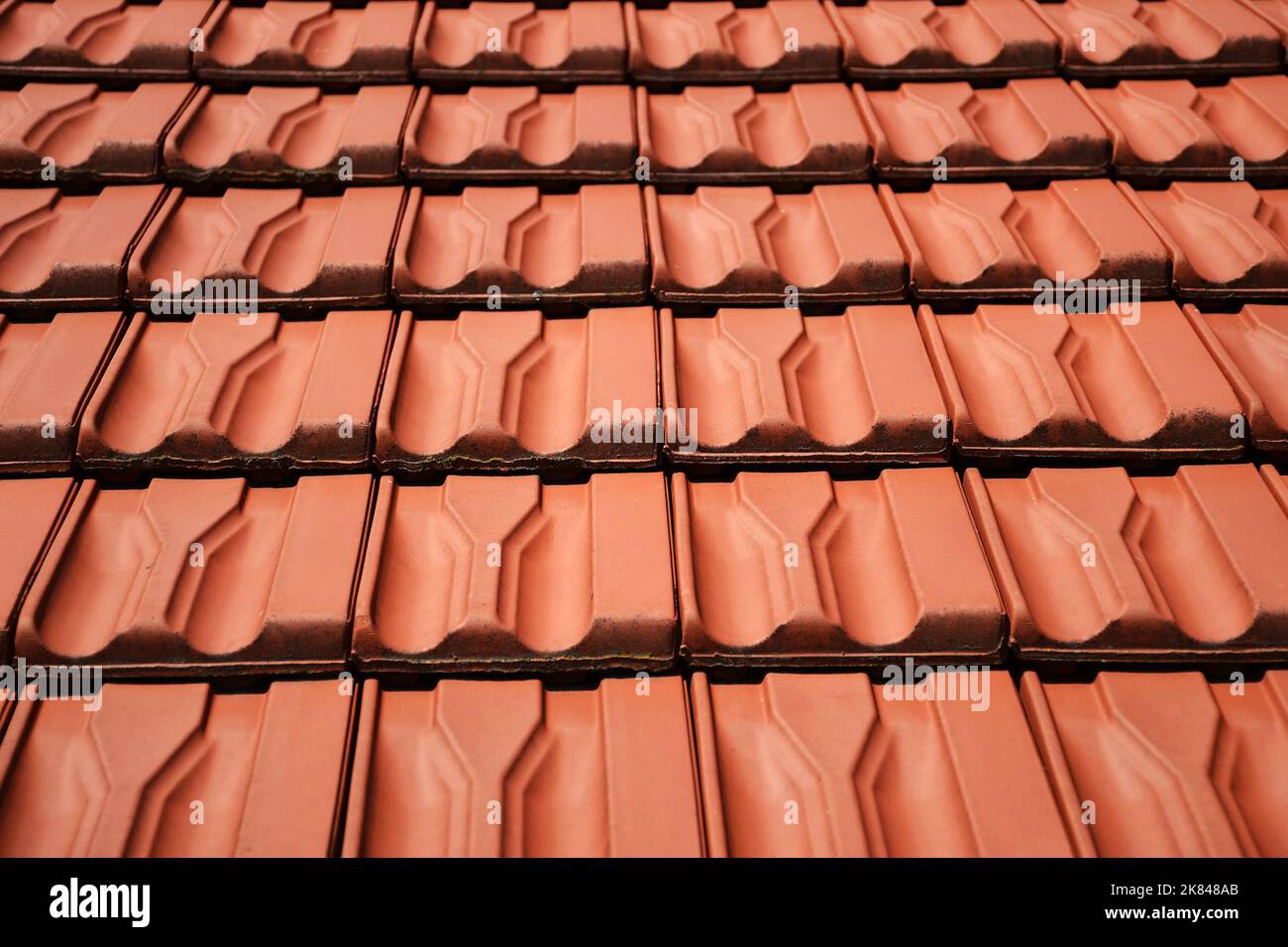 Red clay roof tiles background Stock Photo - Alamy