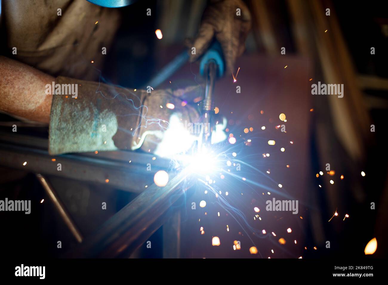 Steel welding. Creation of steel seam. Metal work. High temperature ...