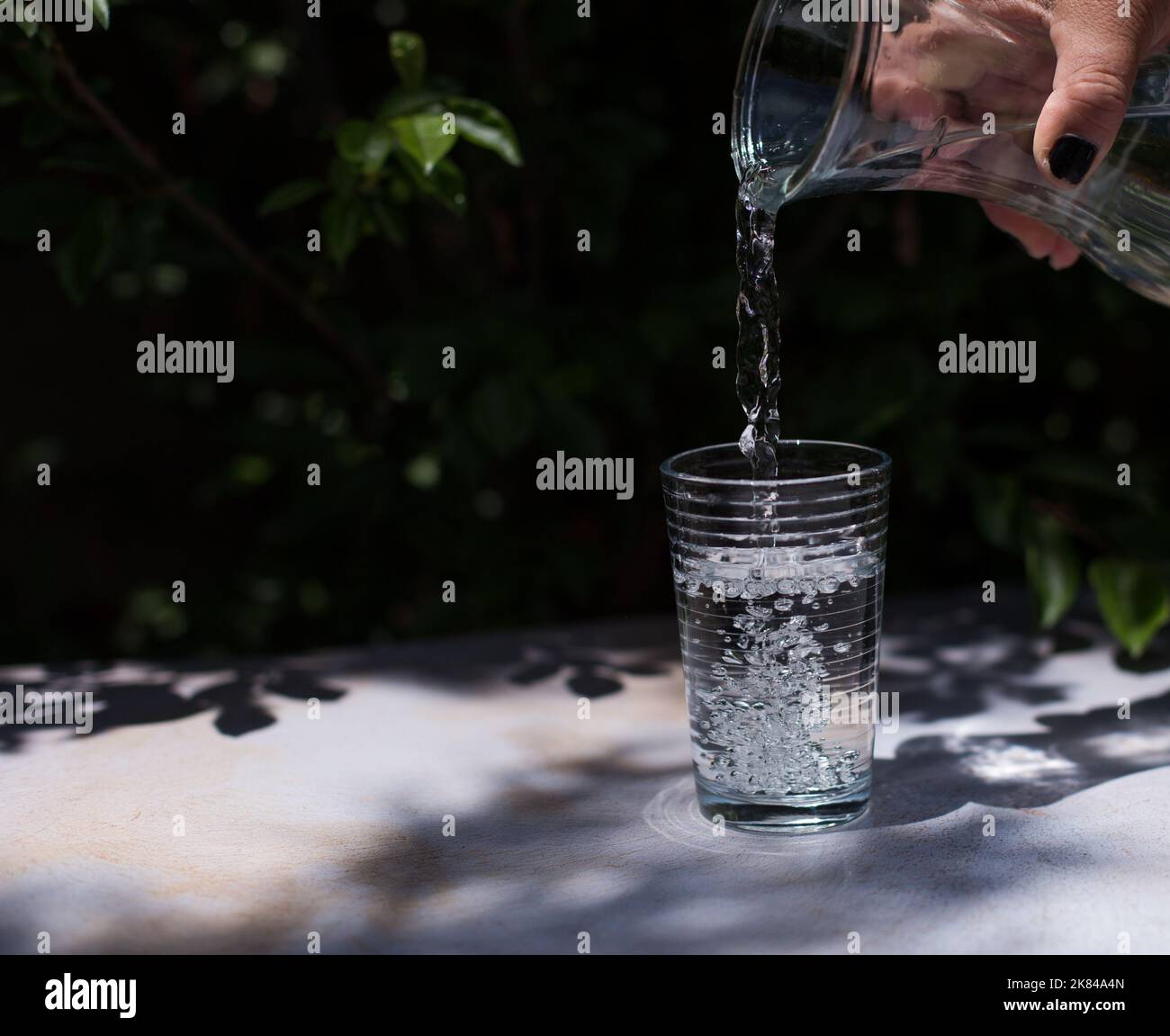 Pouring water in a glass beaker. Concept of healthy beverages Stock ...