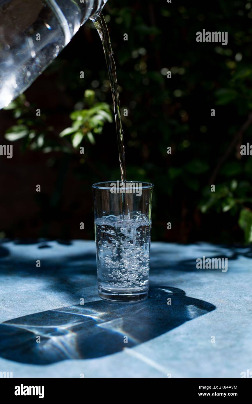 Pouring water in a glass beaker. Concept of healthy beverages Stock ...