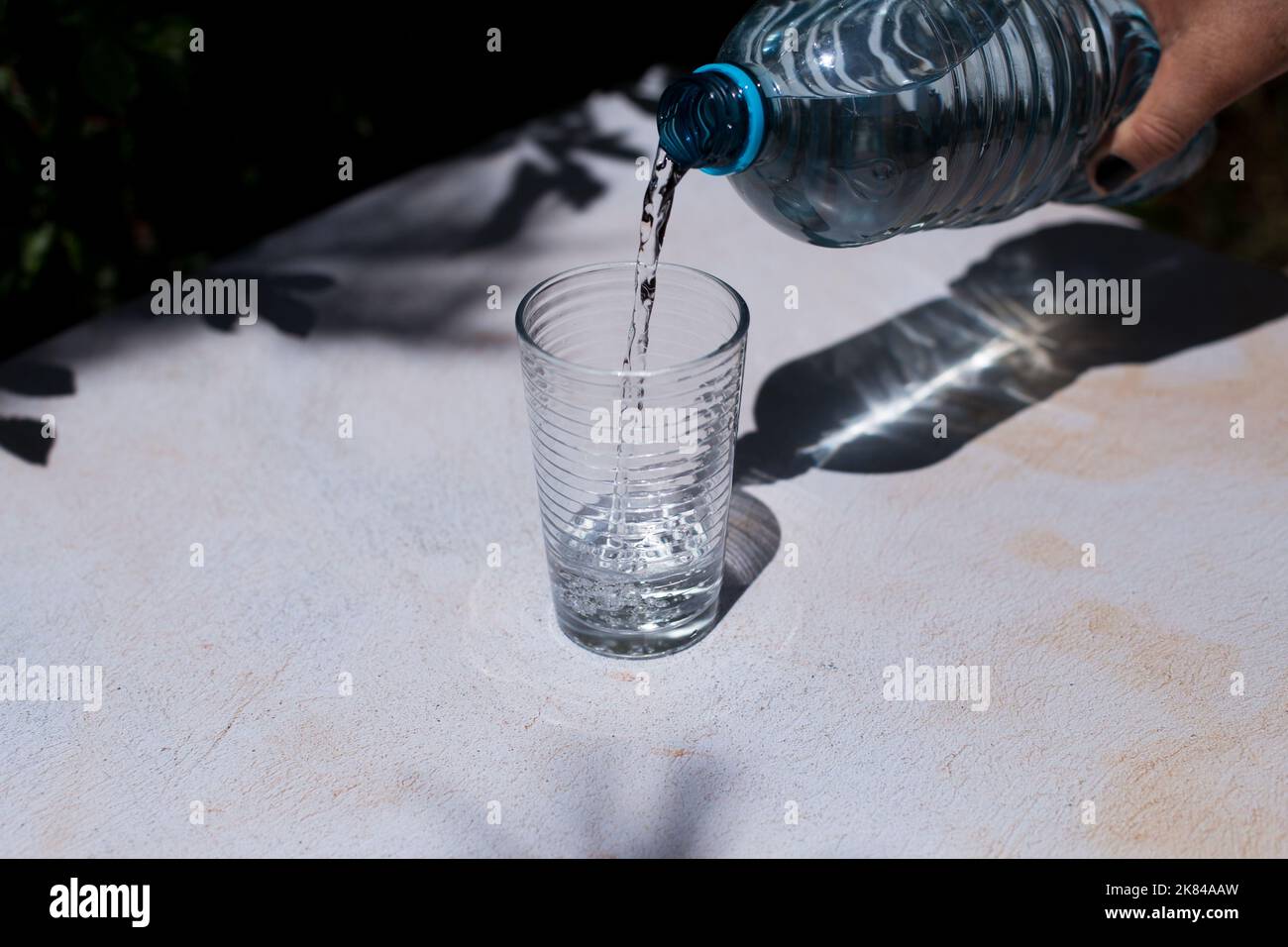 Pouring water in a glass beaker. Concept of healthy beverages Stock ...