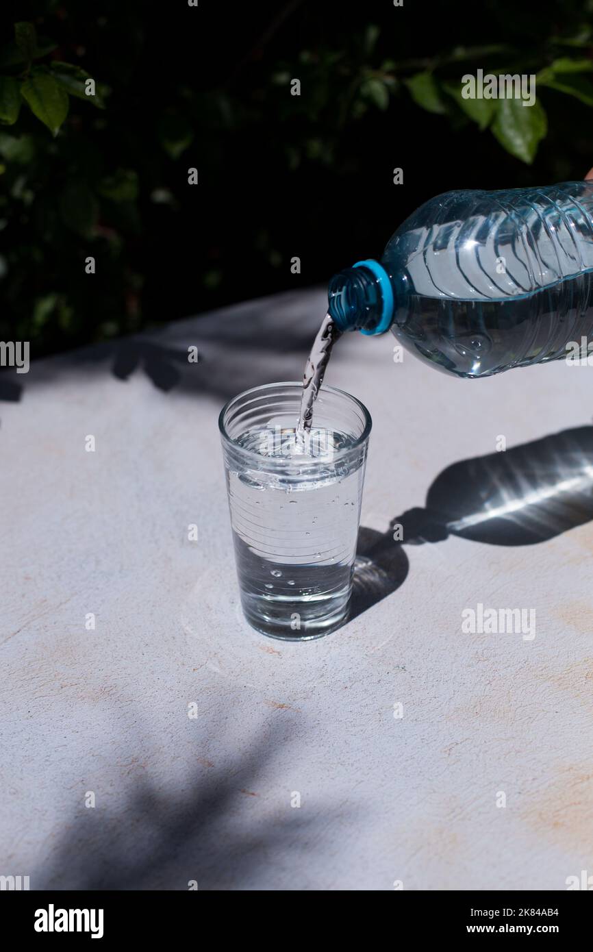 Pouring water in a glass beaker. Concept of healthy beverages Stock ...