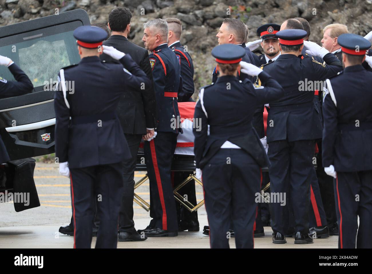 Officers from South Simcoe police and York Region salute as the first ...