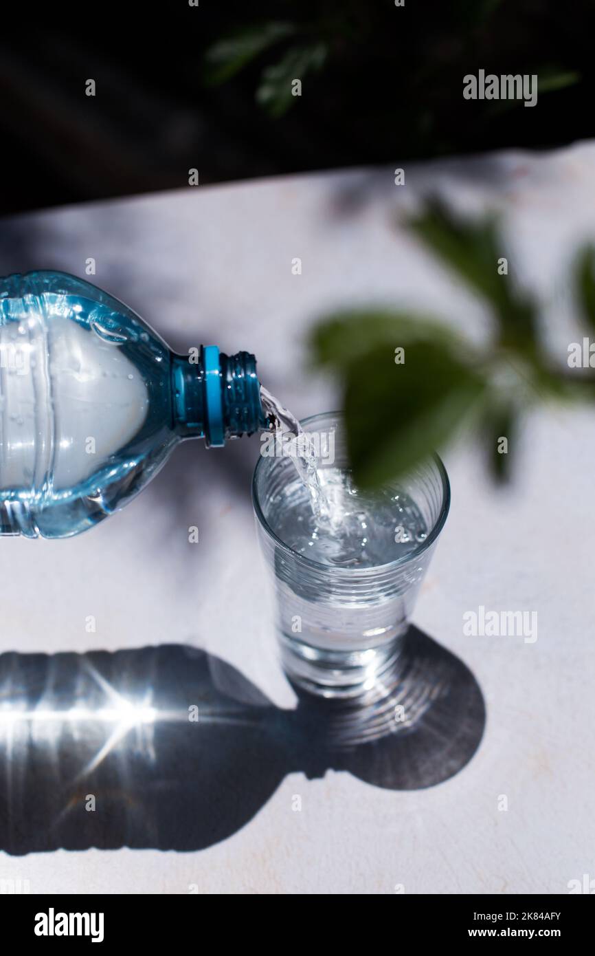 Pouring water in a glass beaker. Concept of healthy beverages Stock ...