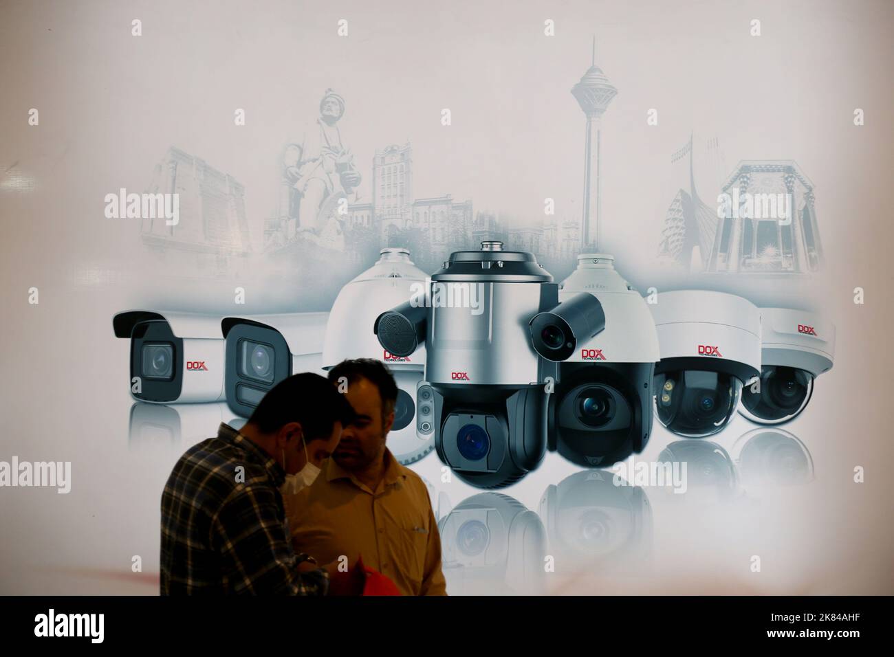 October 20, 2022, Tehran, Tehran, Iran: Iranian visitors walk past an advertising banner of the ...