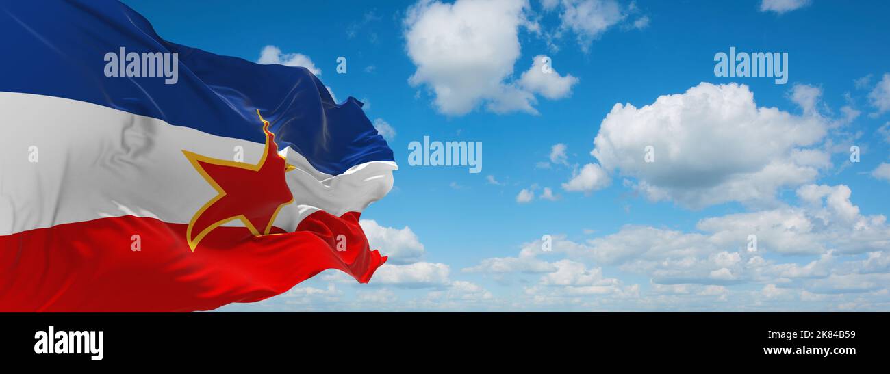 flag of Yugoslavia 1946 1992, Europe at cloudy sky background ...