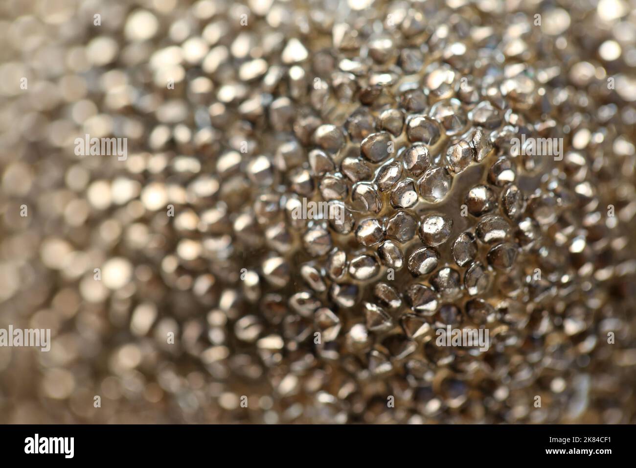 Wallpaper metallic granular phone.Shiny grainy texture. background in bronze tones.wall texture ...