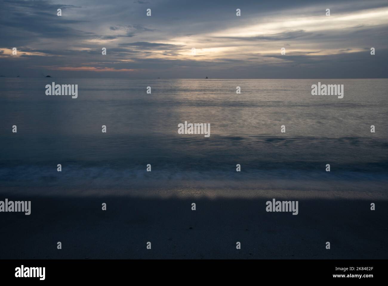 beautiful late evening sky at the beach Stock Photo - Alamy
