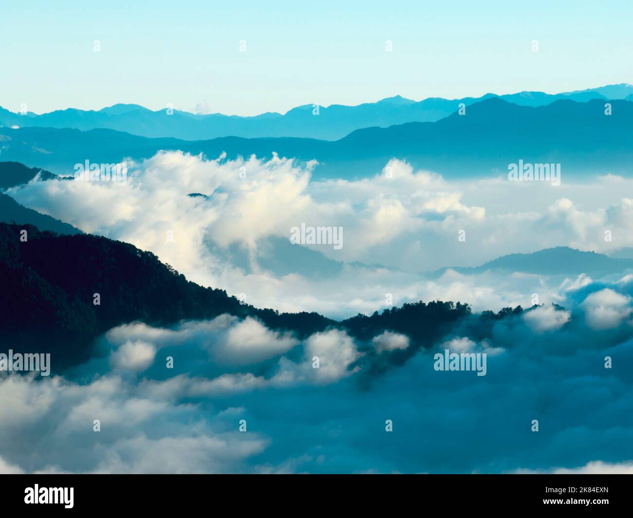 Aerial view of mountains and clouds at sunset in summer. Hehuan ...