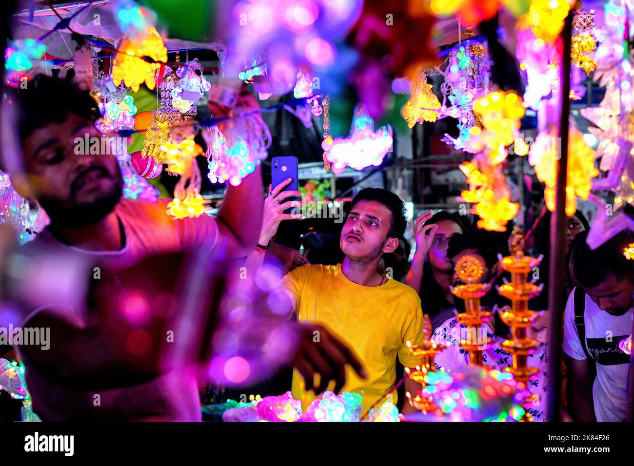 Kolkata, India. 20th Oct, 2022. People seen buying Led lights to ...