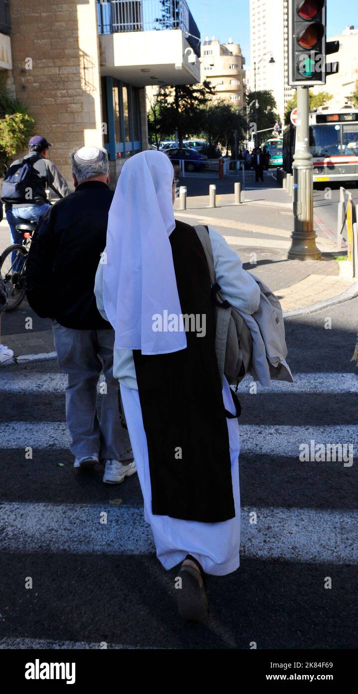 Catholic nun walking in street hi-res stock photography and images - Alamy