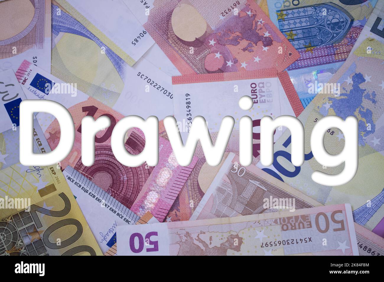 Drawing word with money. Paper currency background with different ...