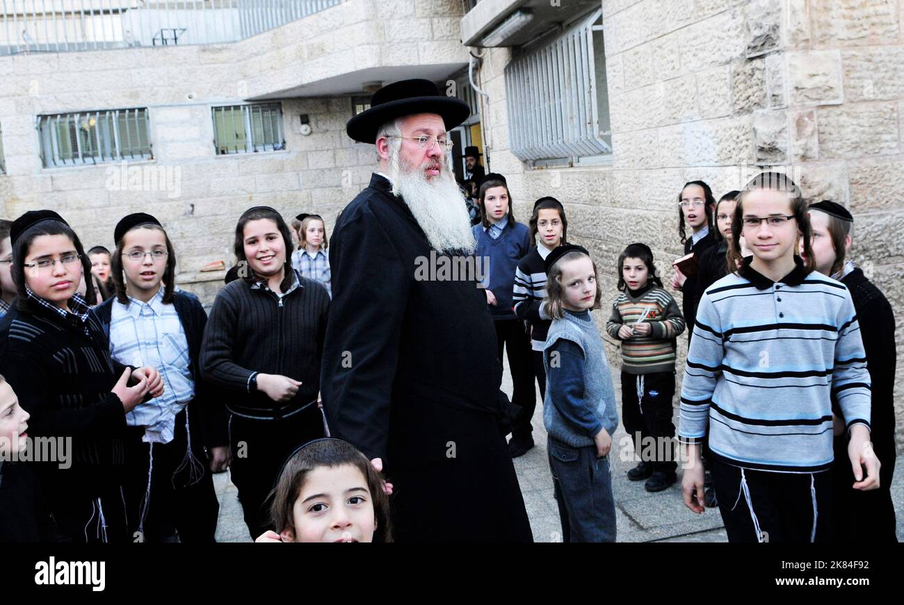 Cheerful & happy. Orthodox Jewish boys with their Rebbe in the ...