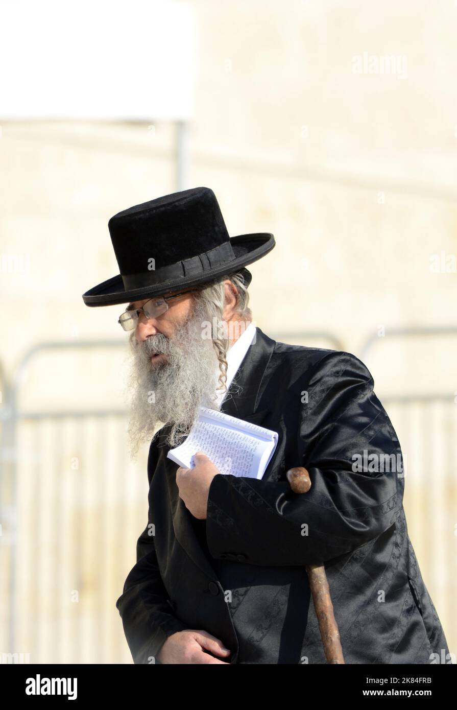 A Jewish man walking to the Wailing Wall / Western Wall in the Jewish ...