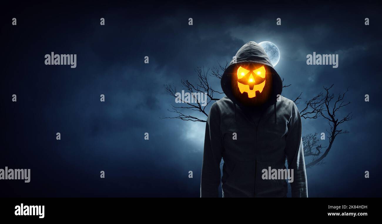 Scary and creepy male monster with gouged eyes looking like a skull ...