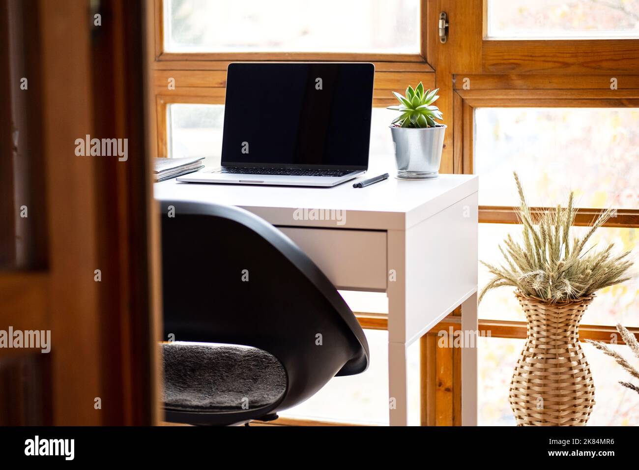 Cozy workplace on balcony. Home office space background Stock Photo - Alamy