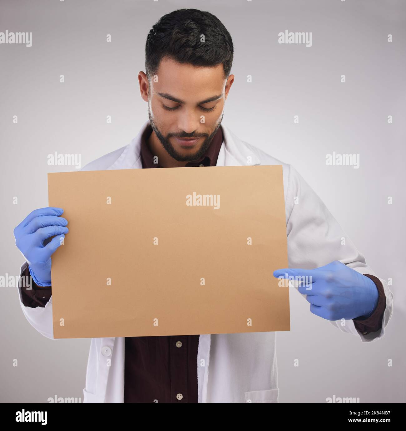 This is all you need. a handsome young doctor standing alone in the ...